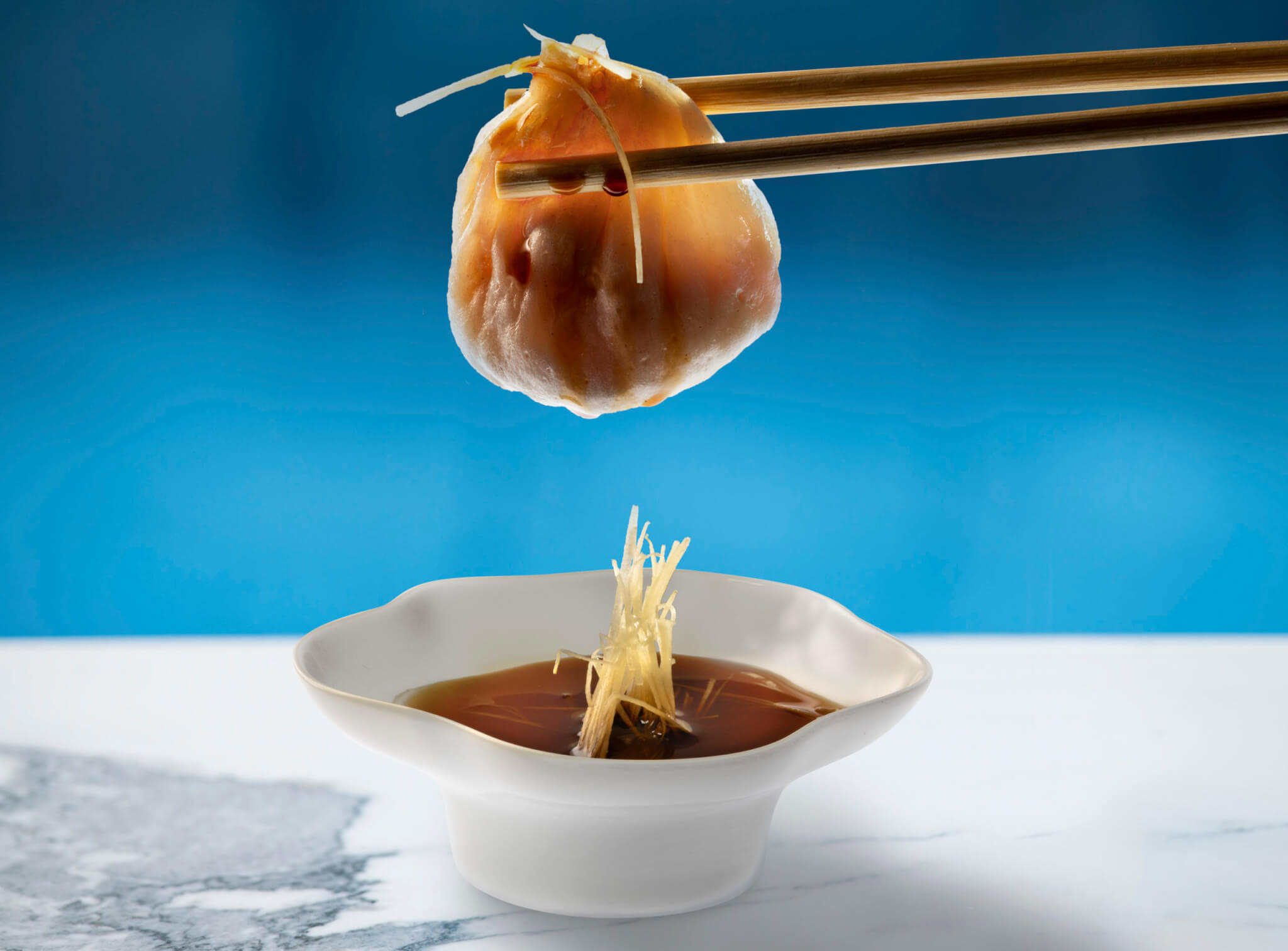 the History of Soup Dumplings, and How to Eat Them